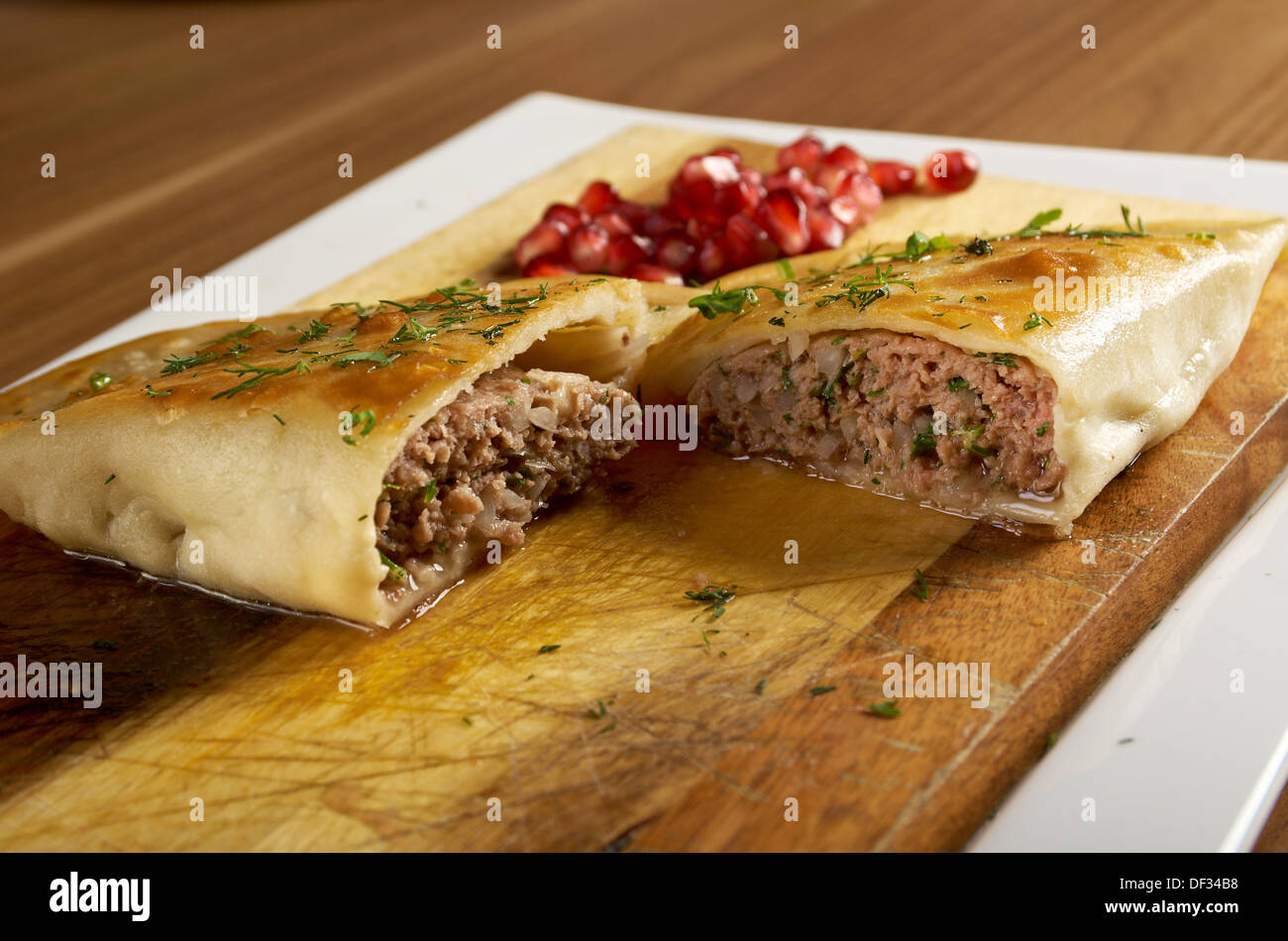 Qutab- baked Chebureki traditional georgian meat pastry.meat in a pitta ...