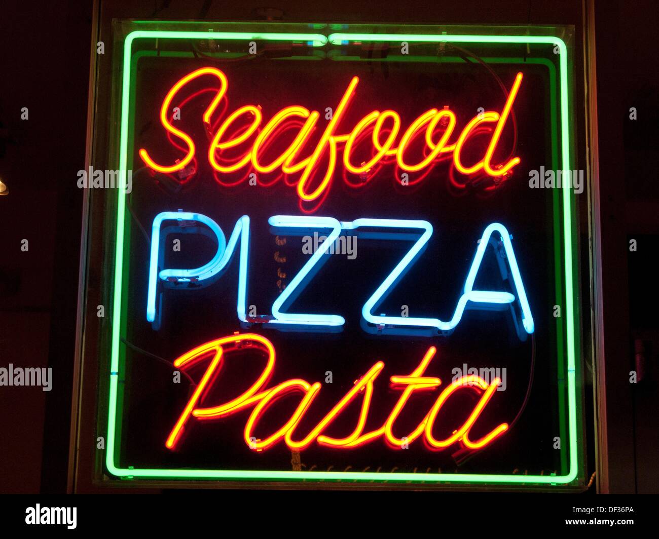 Neon pizza sign hi-res stock photography and images - Alamy