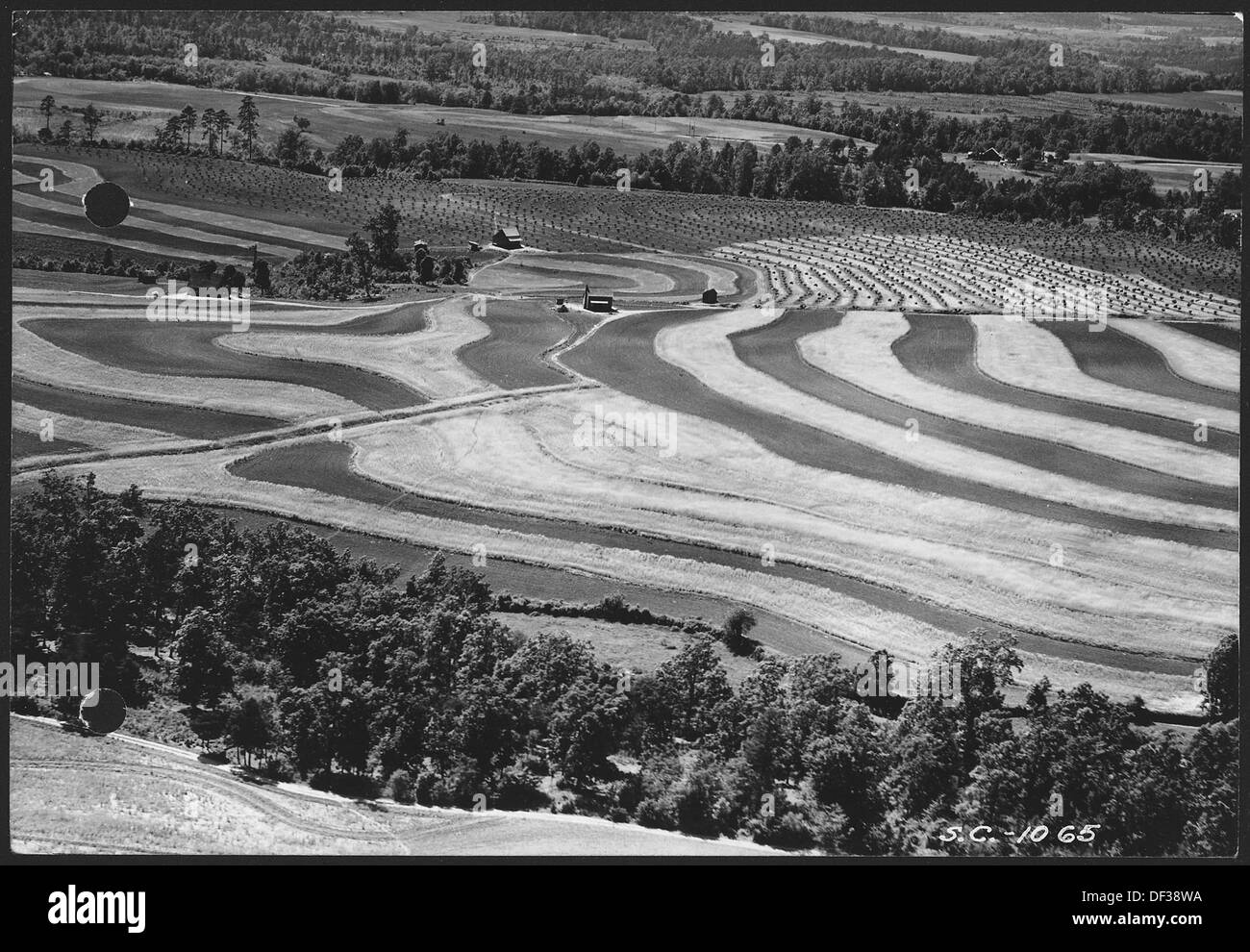 This aerial photograph shows contour farming in Missouri, a method of ...