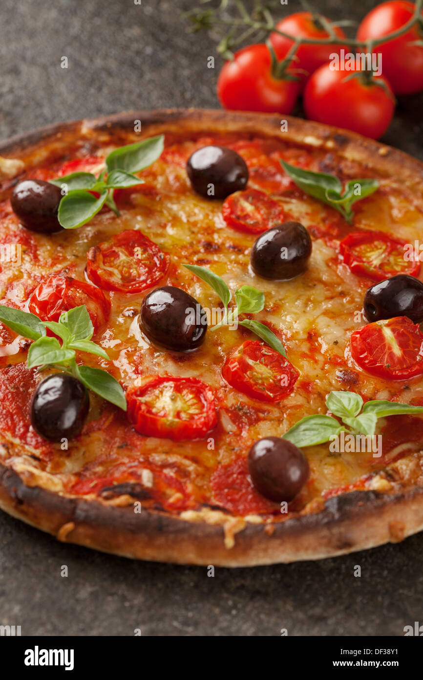 rustic italian pizza with mozzarella, cheese and basil leaves Stock ...