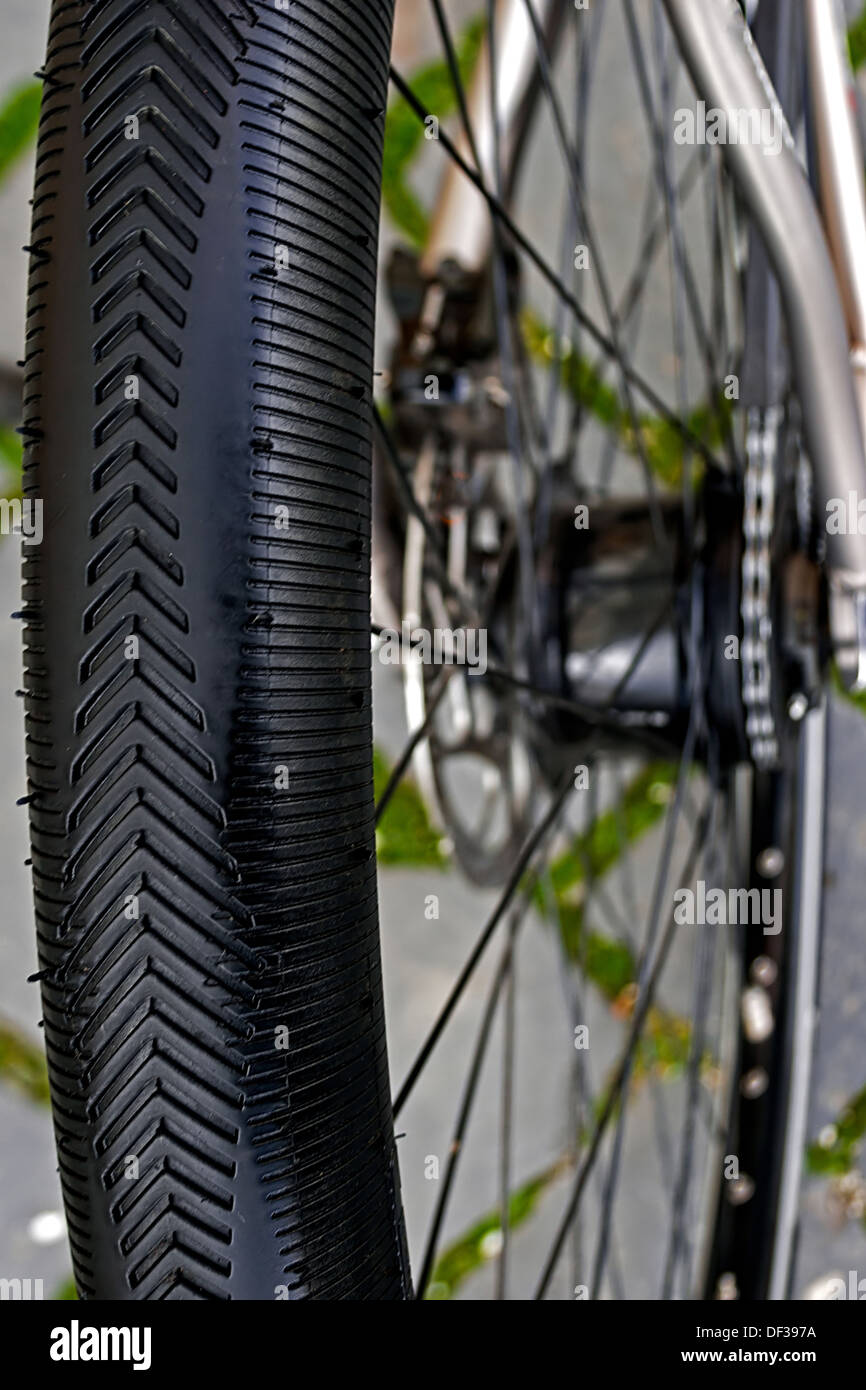 Detail of a rubber wheel city bike Stock Photo - Alamy