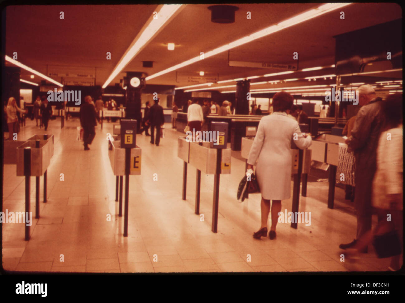 A photograph depicting a unique train station setup, where trains enter ...