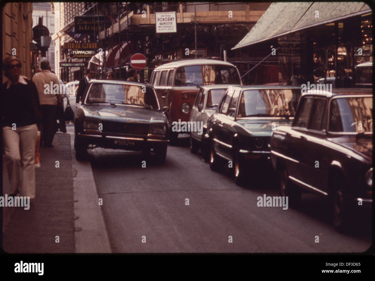 AUTO TRAFFIC ON THE NARROW STREETS POSE A THREAT TO PEDESTRIANS AS CARS ...