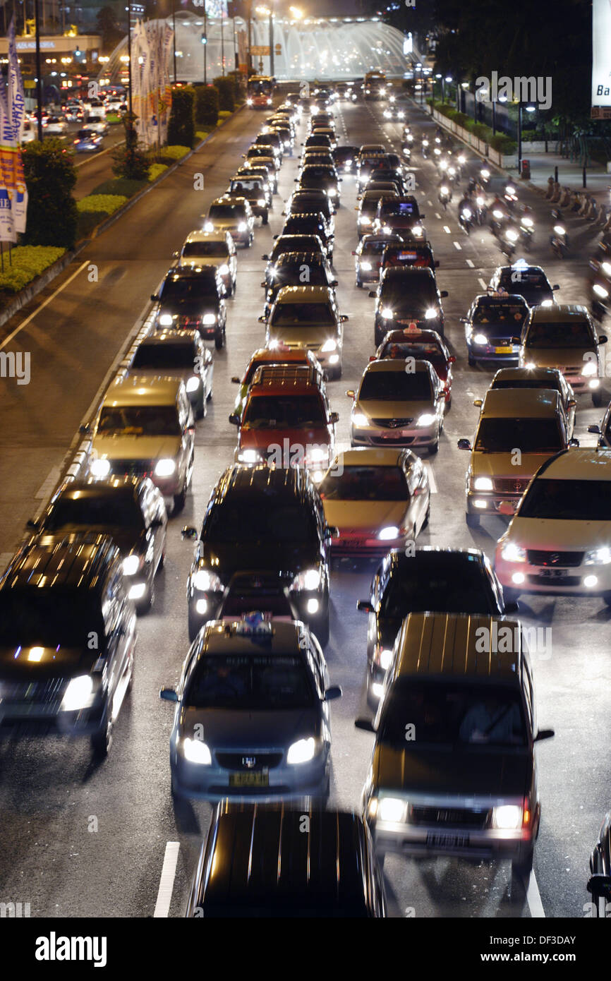 Traffic jam besides a bus lane with an express city busses during the ...