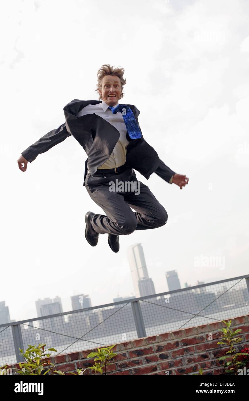 Man jumping over fence in city hi-res stock photography and images - Alamy