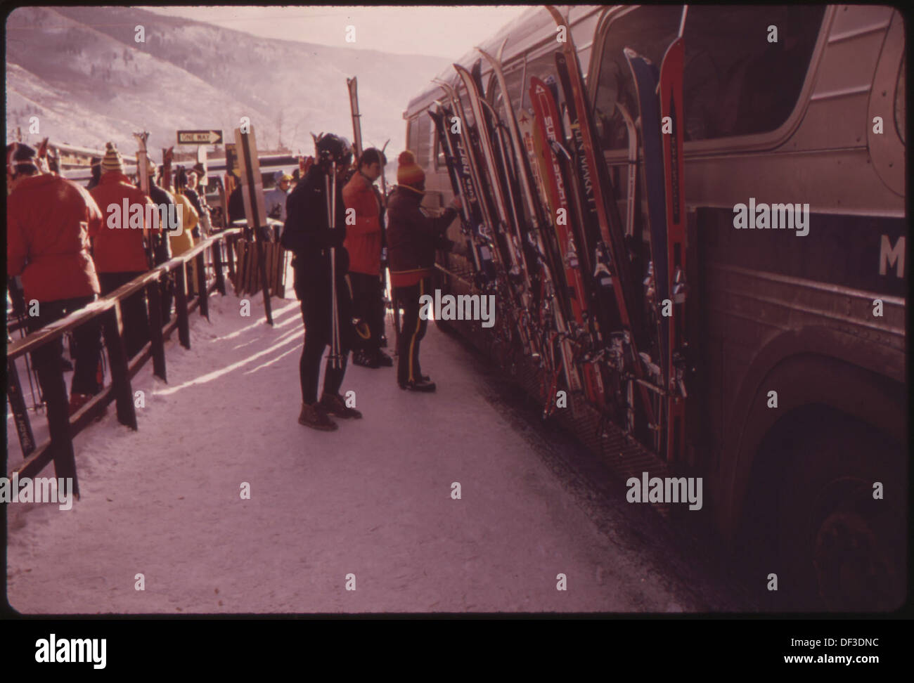 A FREE BUS SHUTTLES SKIERS BETWEEN THE ASPEN AND SNOWMASS SKI AREAS ...