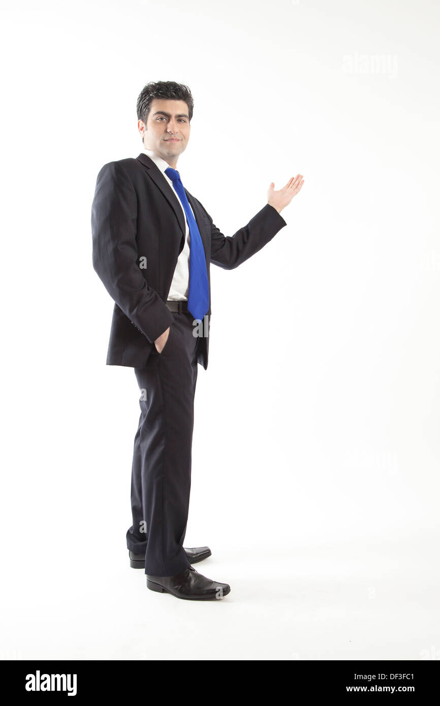 Young business man presenting Stock Photo - Alamy