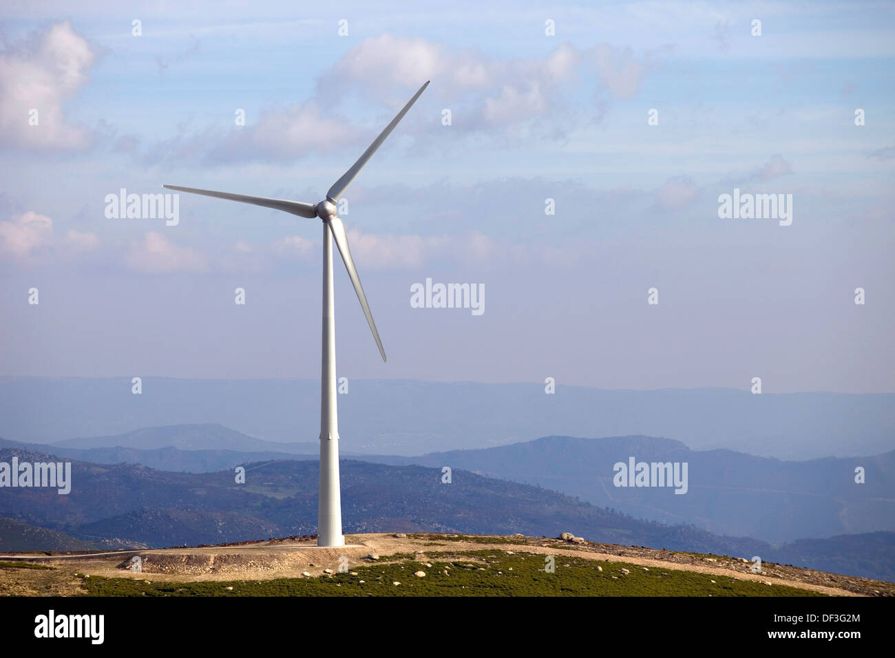 white wind turbine in the top of the mountain Stock Photo - Alamy