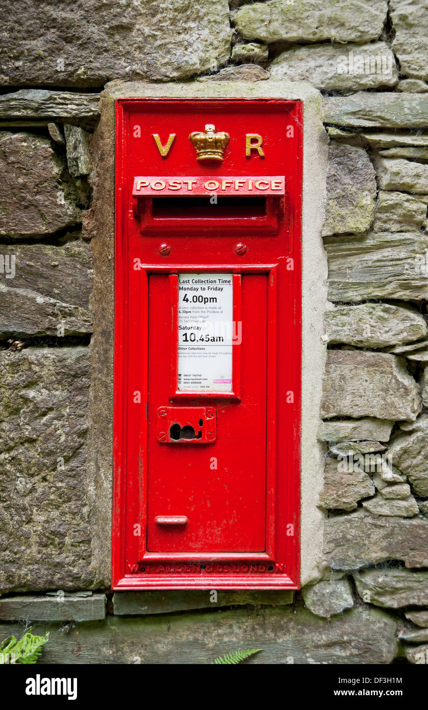 Close up of red postbox post box old Victorian letterbox set in stone ...