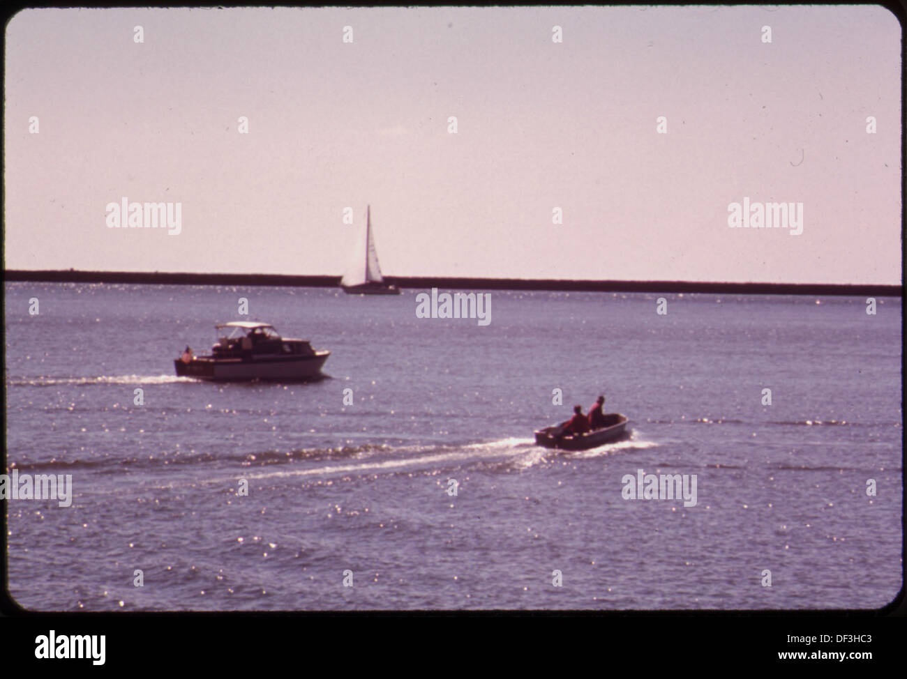 This photograph depicts Buffalo Harbor with boats on Lake Erie ...