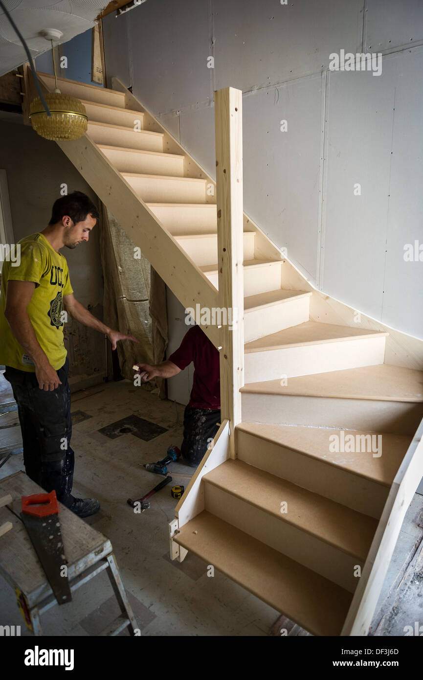 Worker working staircase hi-res stock photography and images - Alamy