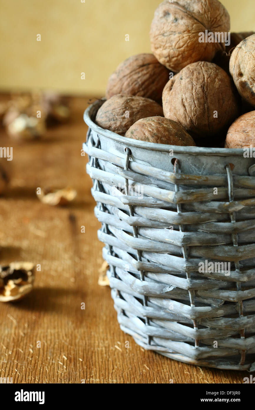 fresh walnuts in a wicker bucket and peel, food Stock Photo - Alamy