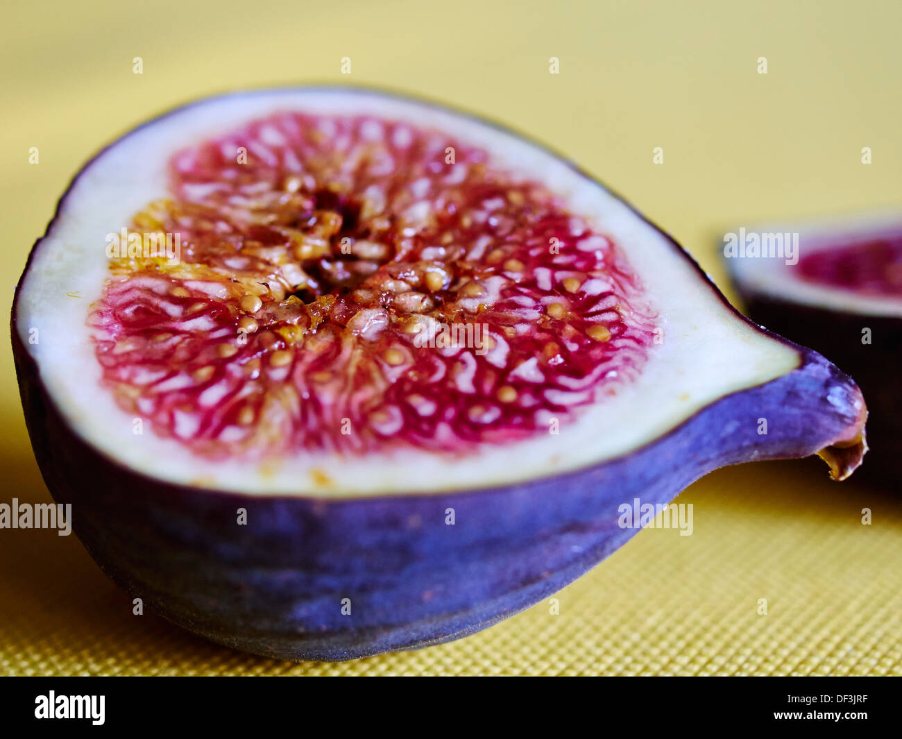 Closeup with a sliced fresh common fig Stock Photo - Alamy