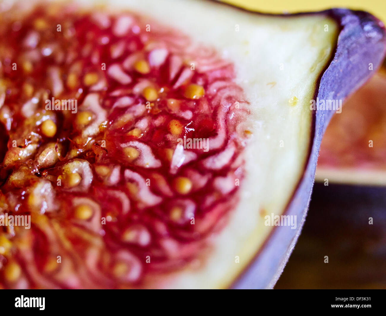 Closeup with a sliced fresh common fig Stock Photo - Alamy