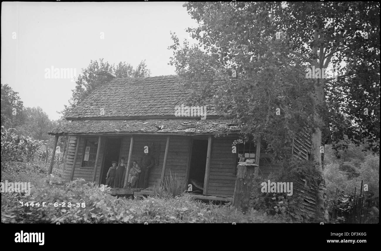 John Clearly's home is captured in this historical photograph, offering ...