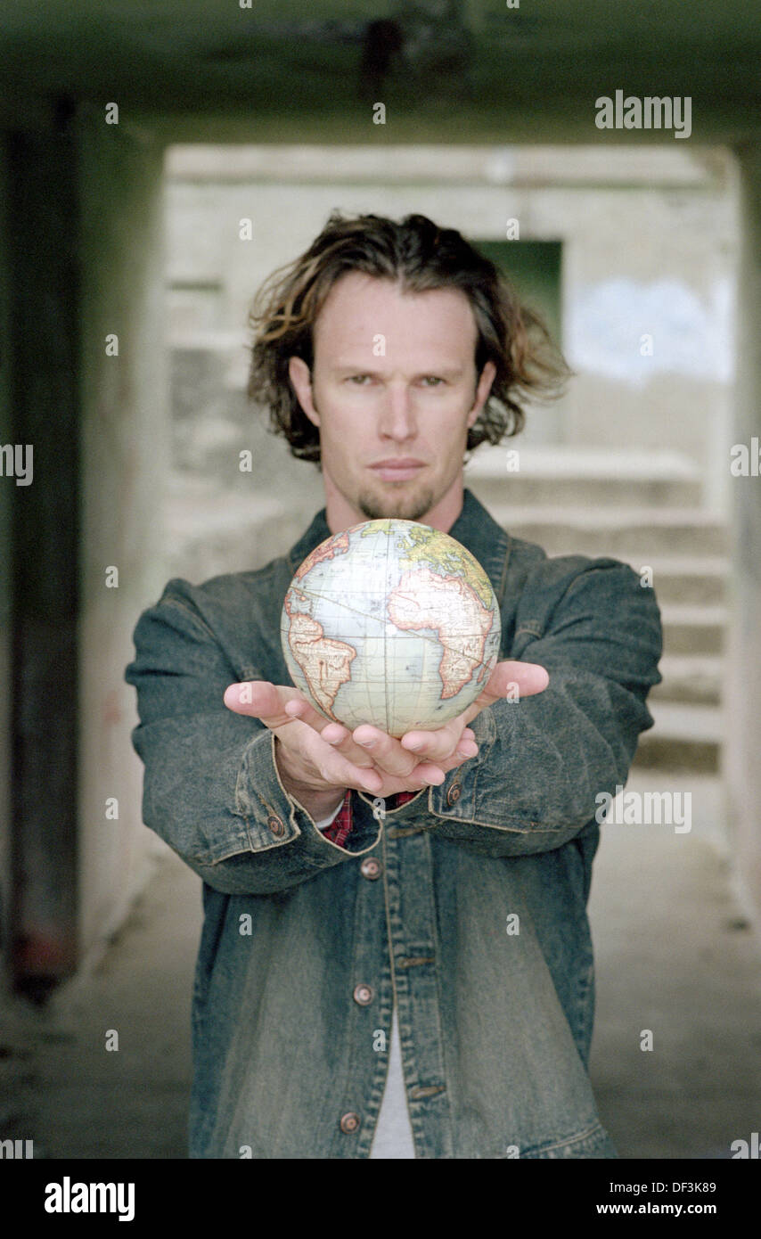 man with globe Stock Photo - Alamy