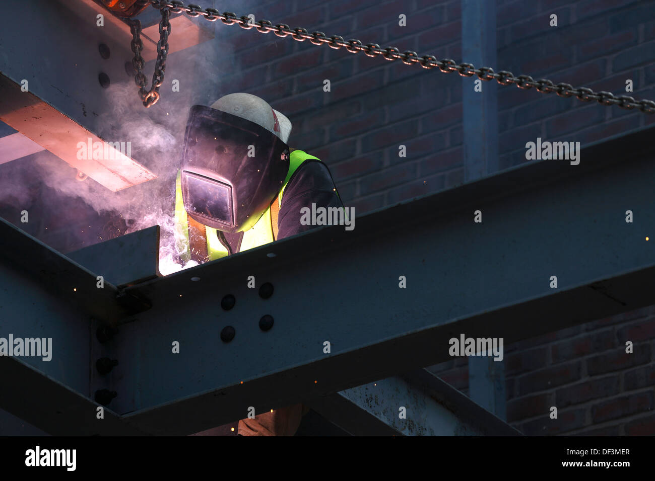 Iron worker welder on construction site Stock Photo - Alamy
