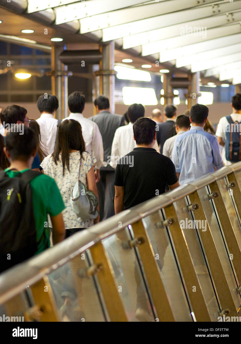 Commuters on their way home from work in Central, Hong Kong Stock Photo ...