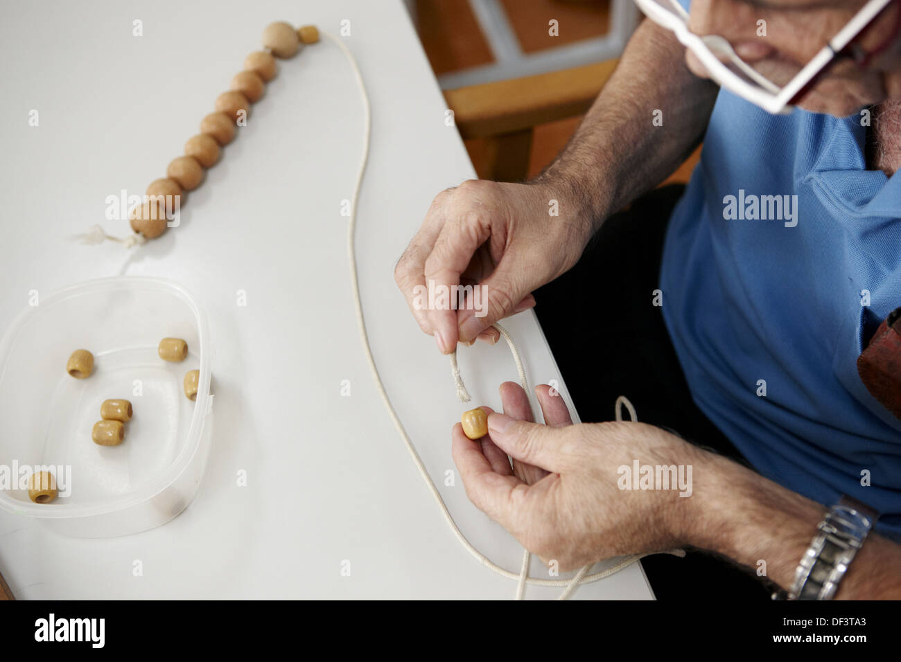 Occupational therapy beads string coordination hi-res stock photography ...