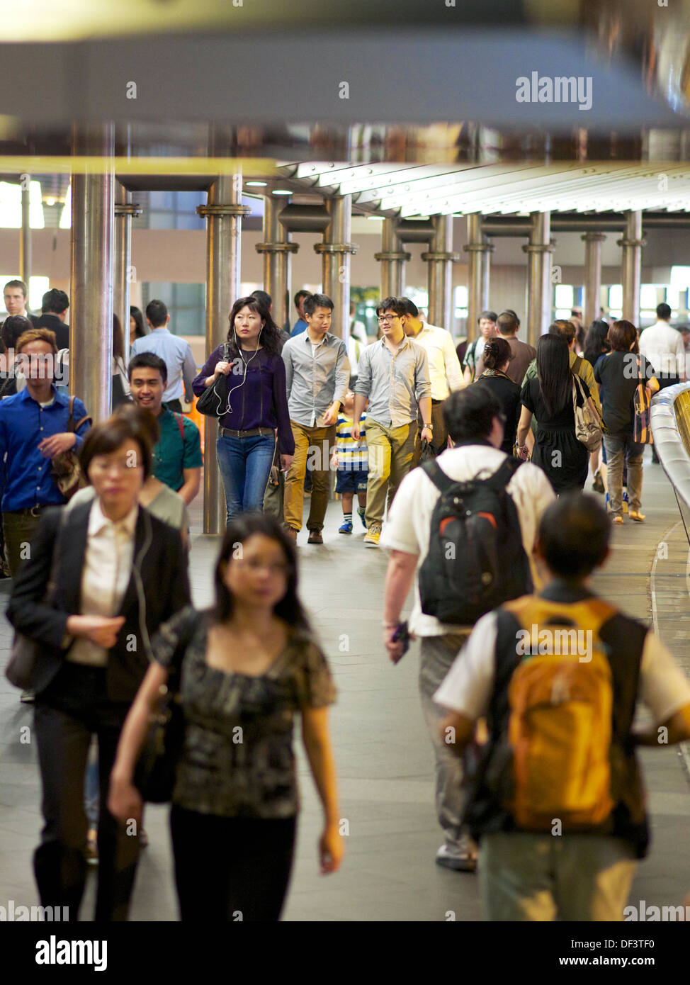 Commuters on their way home from work in Central, Hong Kong Stock Photo ...
