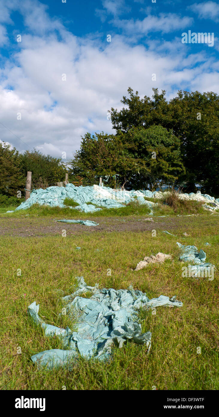 Silage wrapping plastic waste on a farm in Wales UK Stock Photo - Alamy