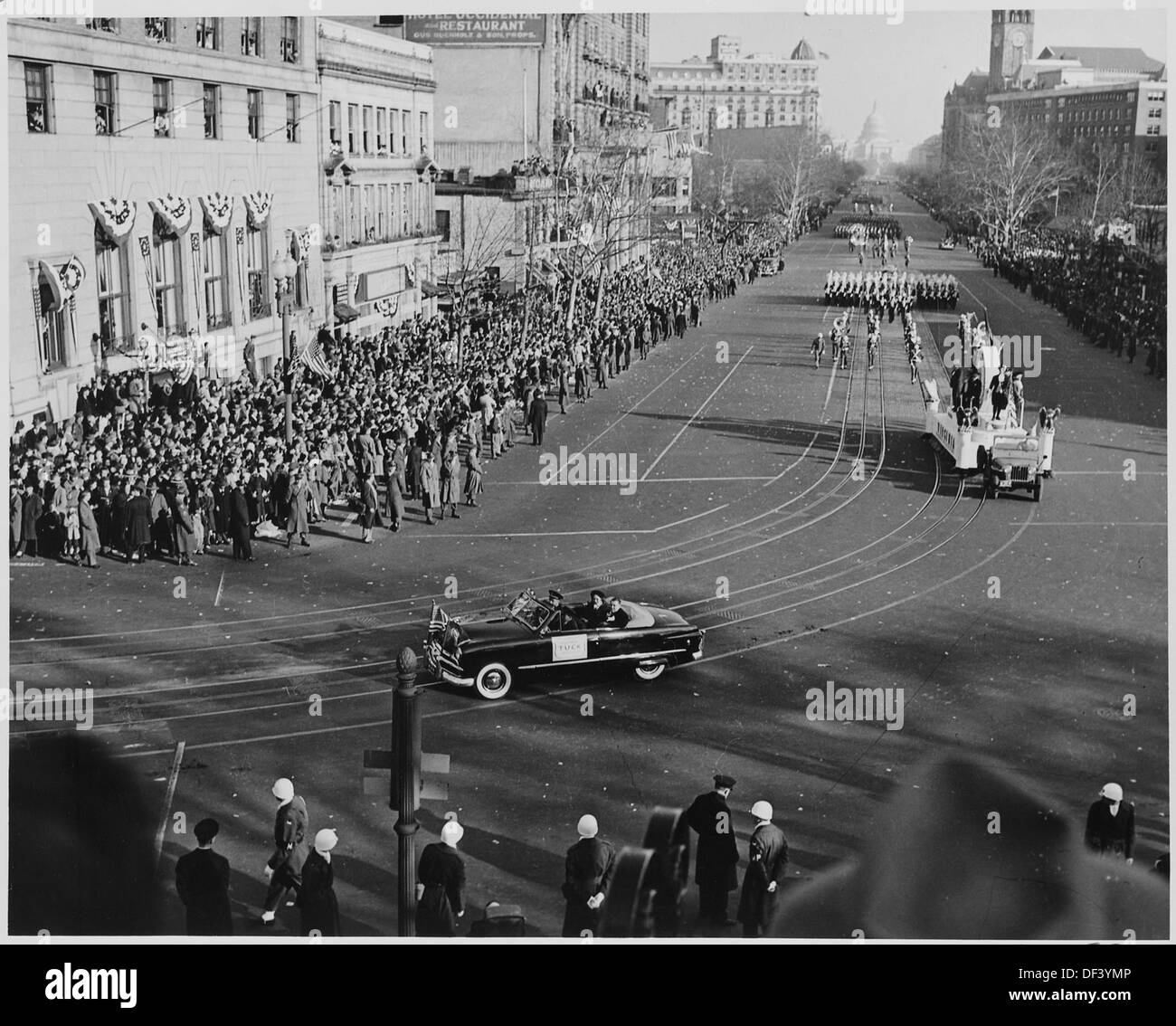 A distant view of President Truman’s inaugural parade featuring the ...