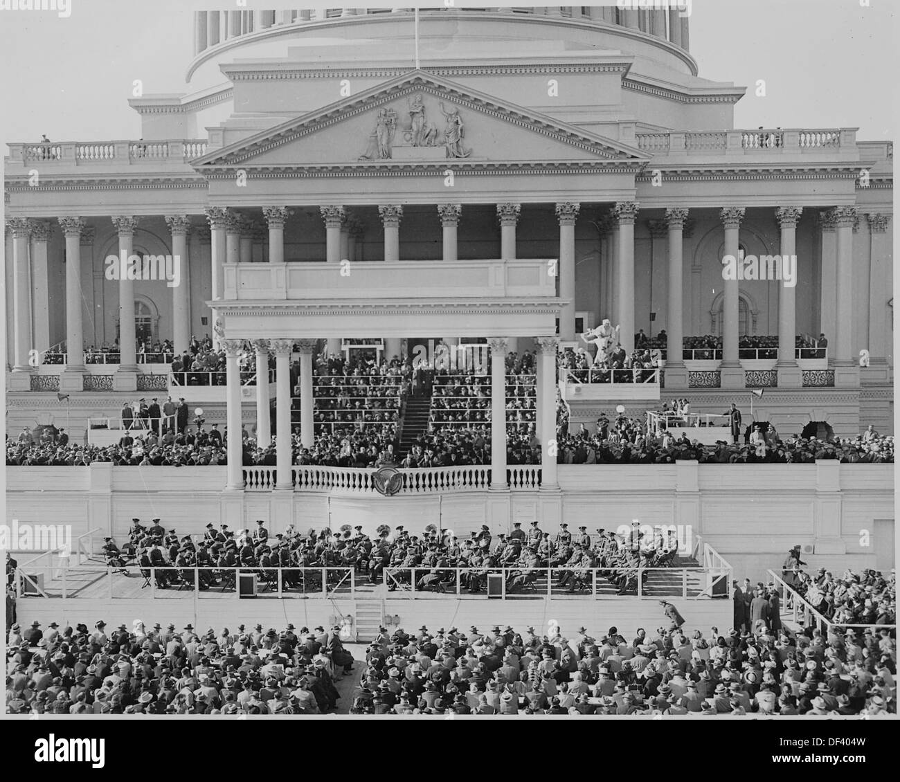 A photograph capturing President Truman speaking at the podium during ...