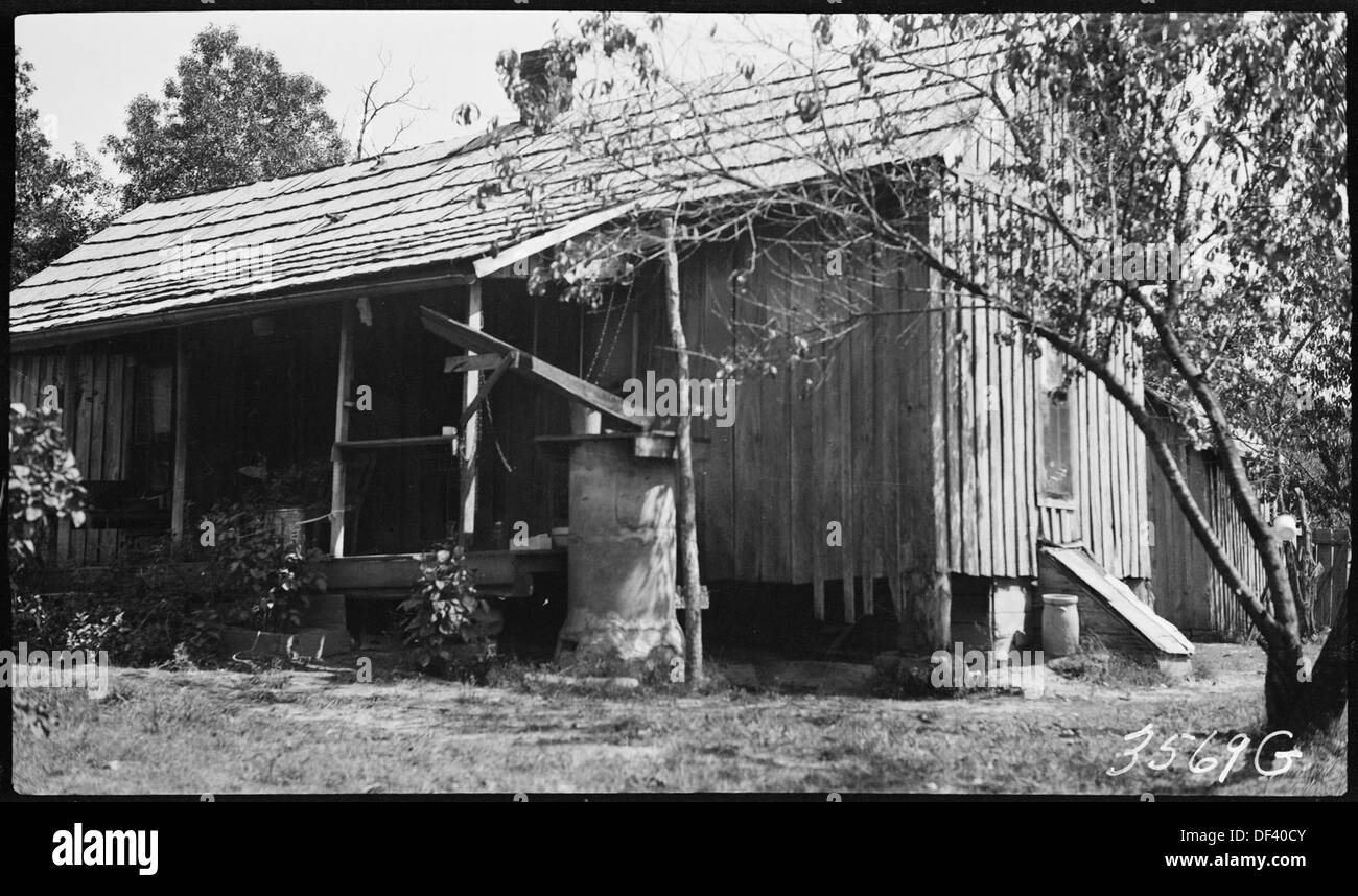 This archival photograph shows the home of J.L. Dodson, captured by the ...