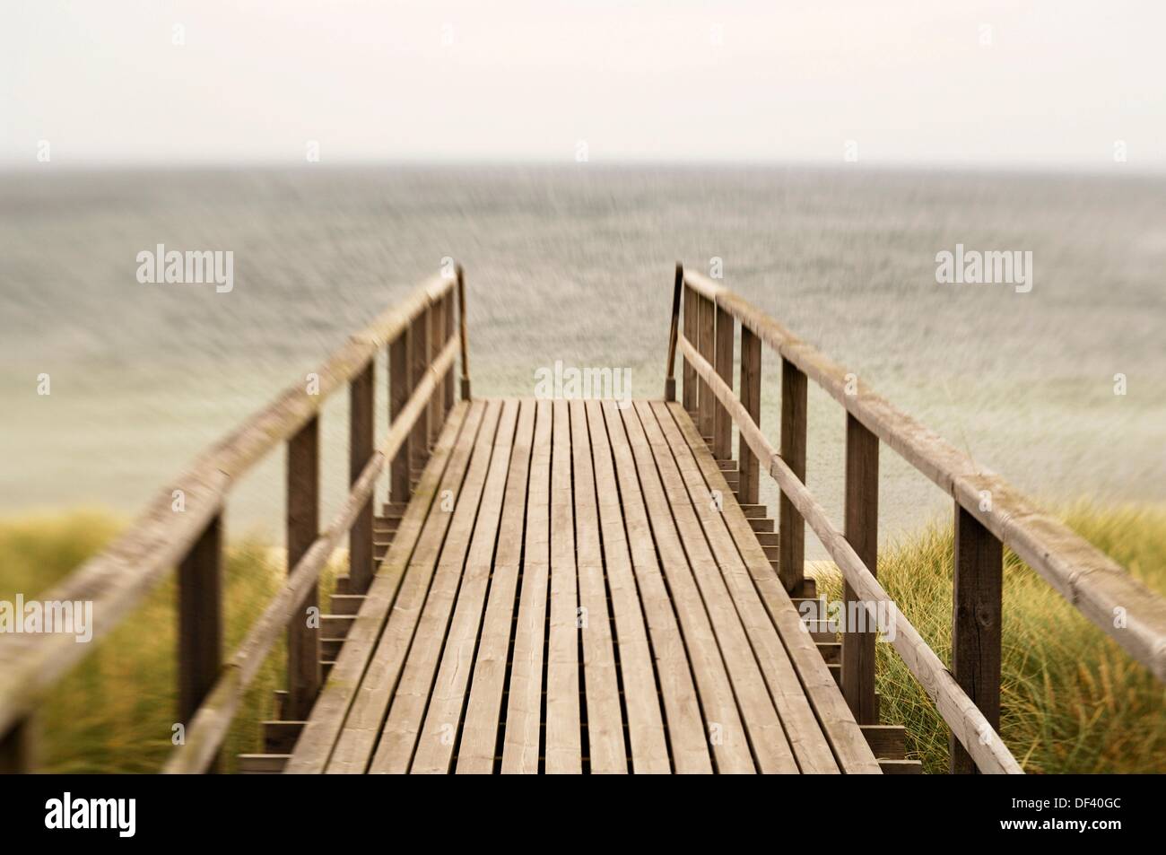 Timber jetty on the beach, in the background, the North Sea, Germany ...