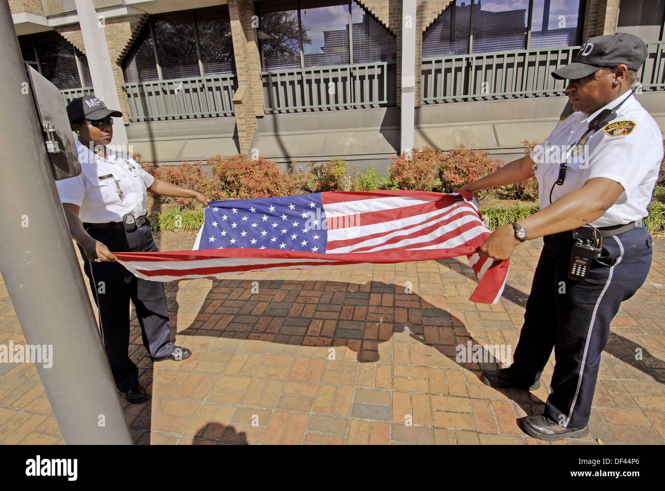 Black female police officer hi-res stock photography and images - Alamy
