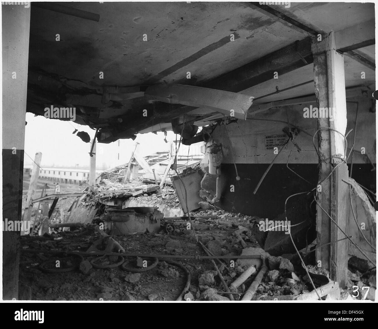 This photograph depicts the explosion damage at the Iowa Ordnance Plant ...