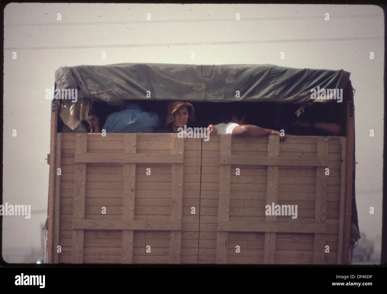 FARM WORKERS TAKING SHELTER DURING A DUST STORM IN SOUTHERN UTAH. (FROM ...