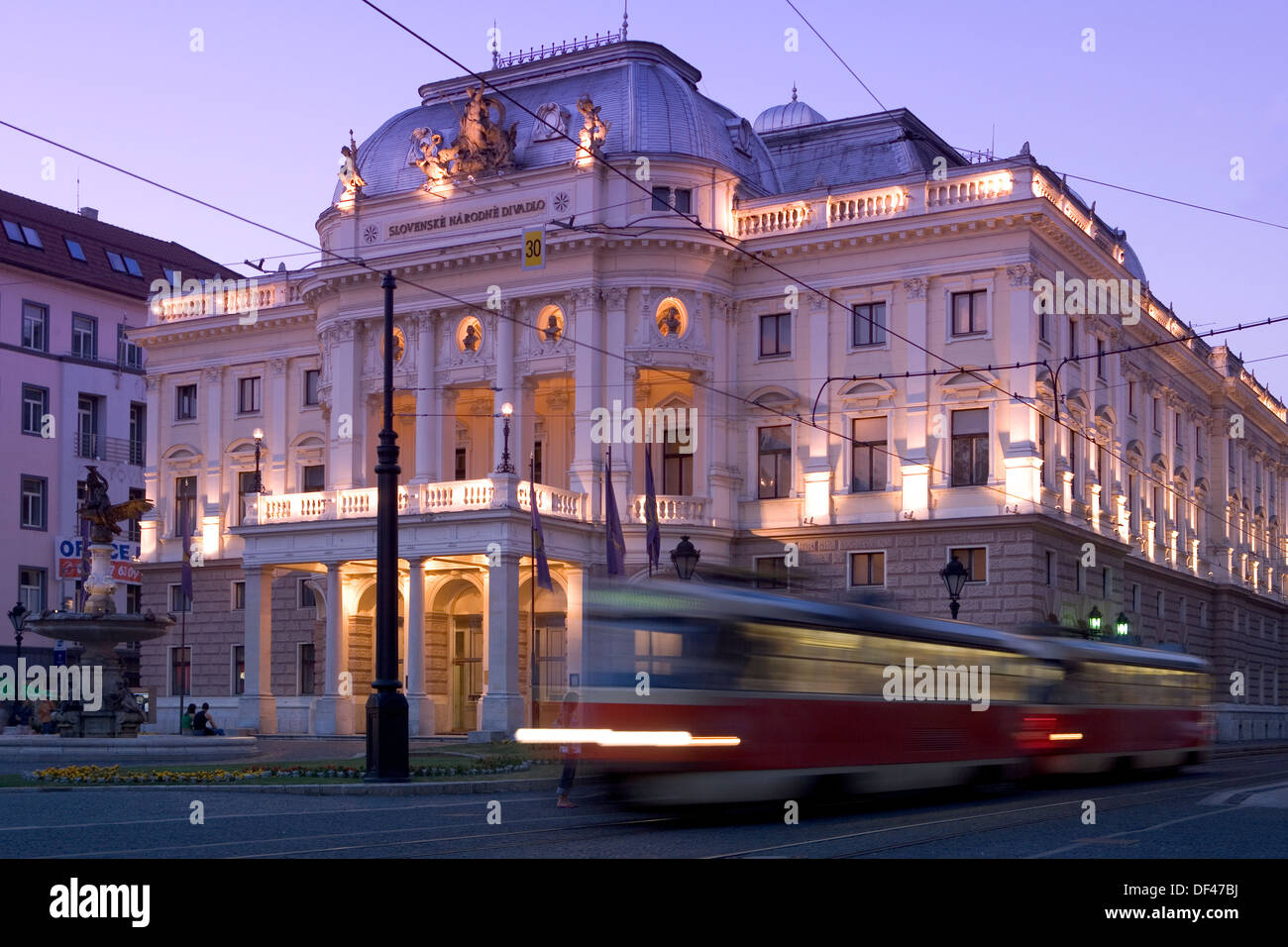 Slovakia, Bratislava, Opera house & tram at twilight Stock Photo - Alamy