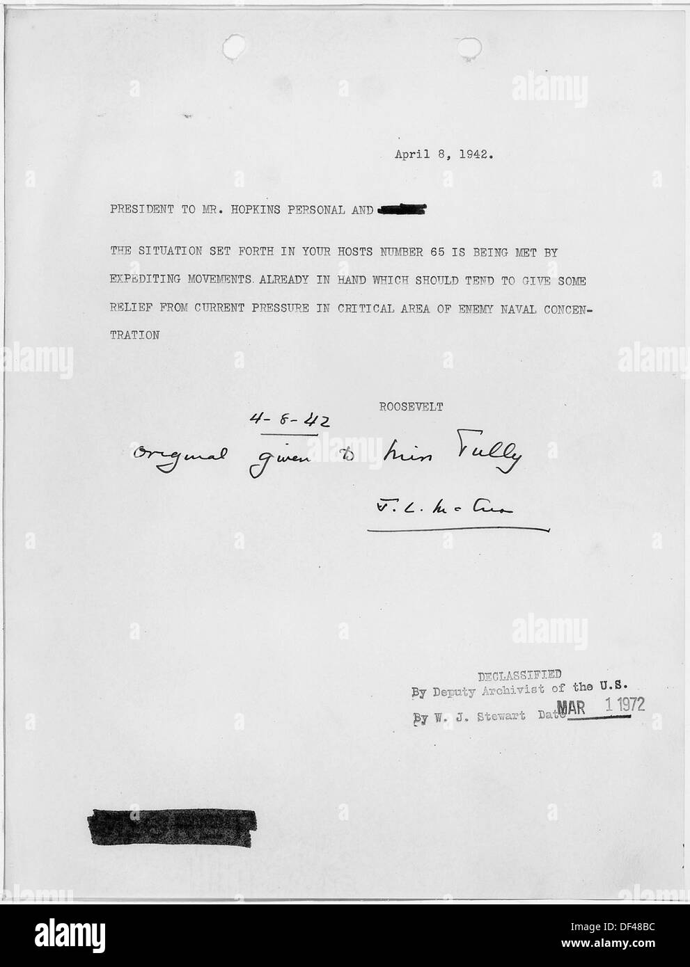 A photograph showing Franklin D. Roosevelt writing a letter to Harry ...