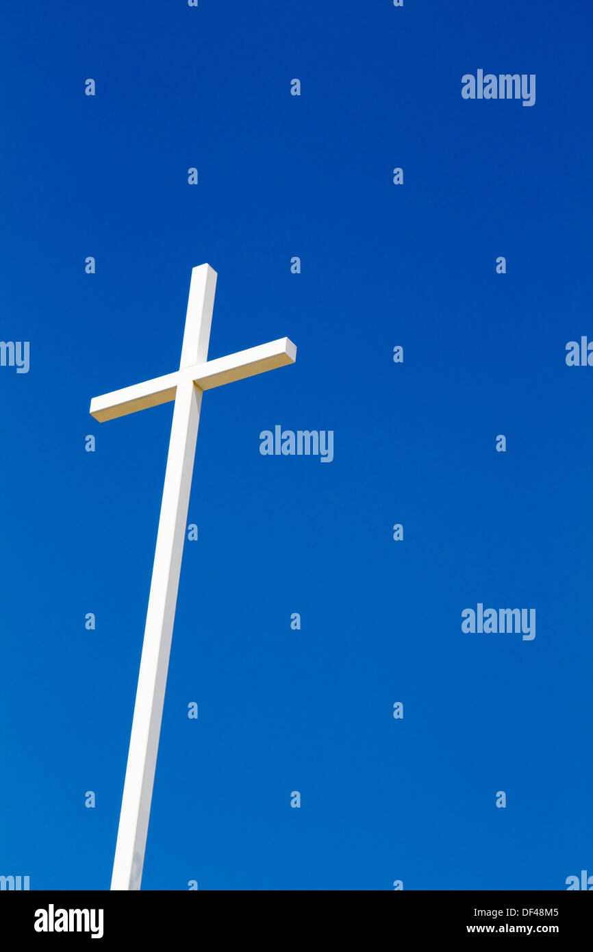 Christian cross made of steel against a background of blue sky Stock ...