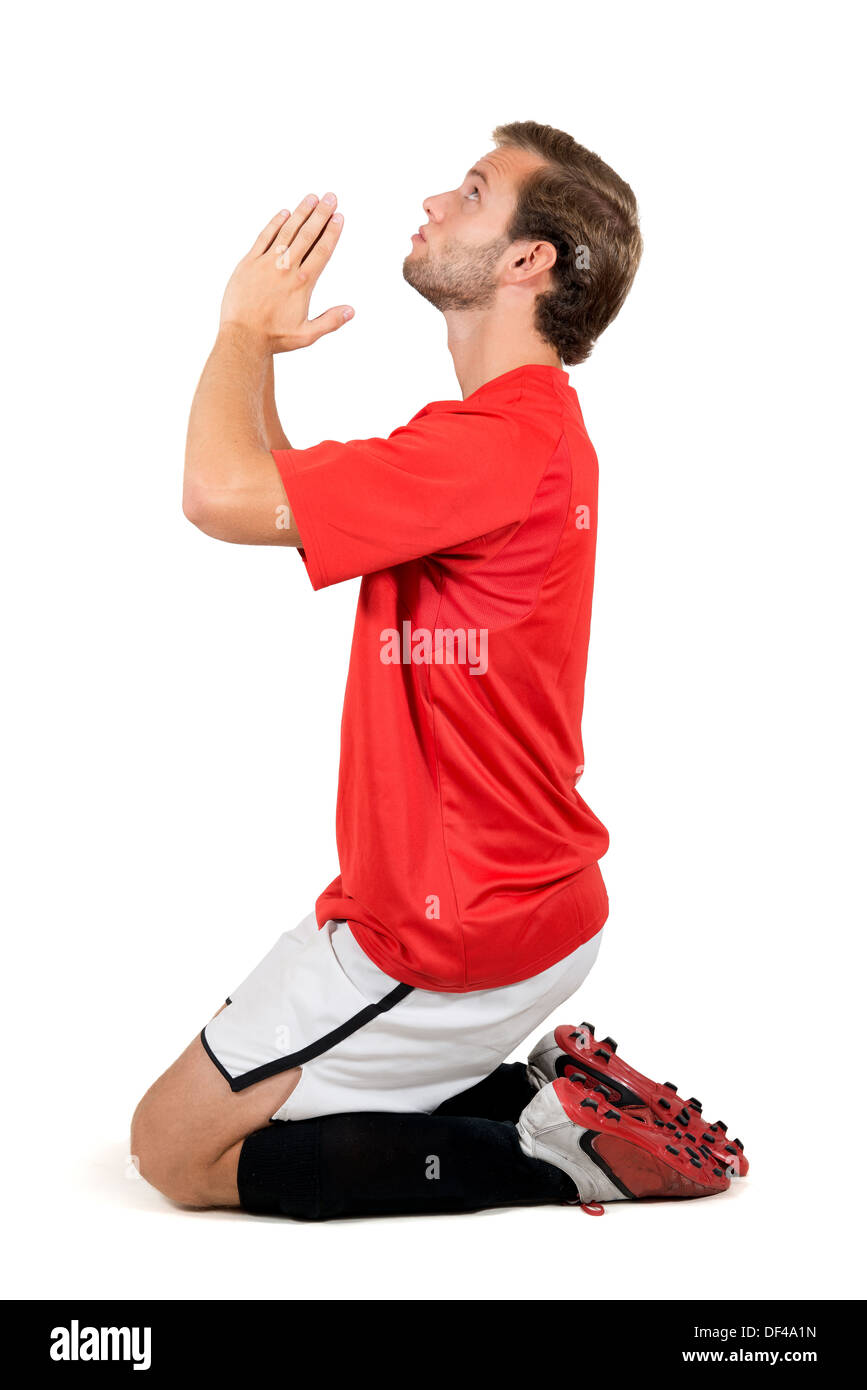 Football team praying Cut Out Stock Images & Pictures - Alamy