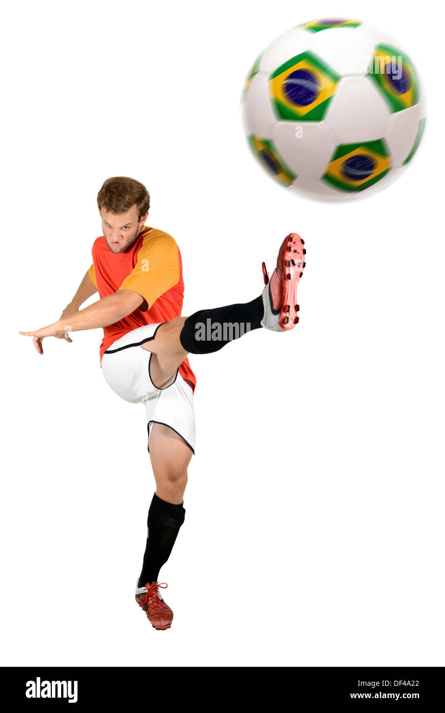 Football player kicking a ball isolated in white Stock Photo - Alamy
