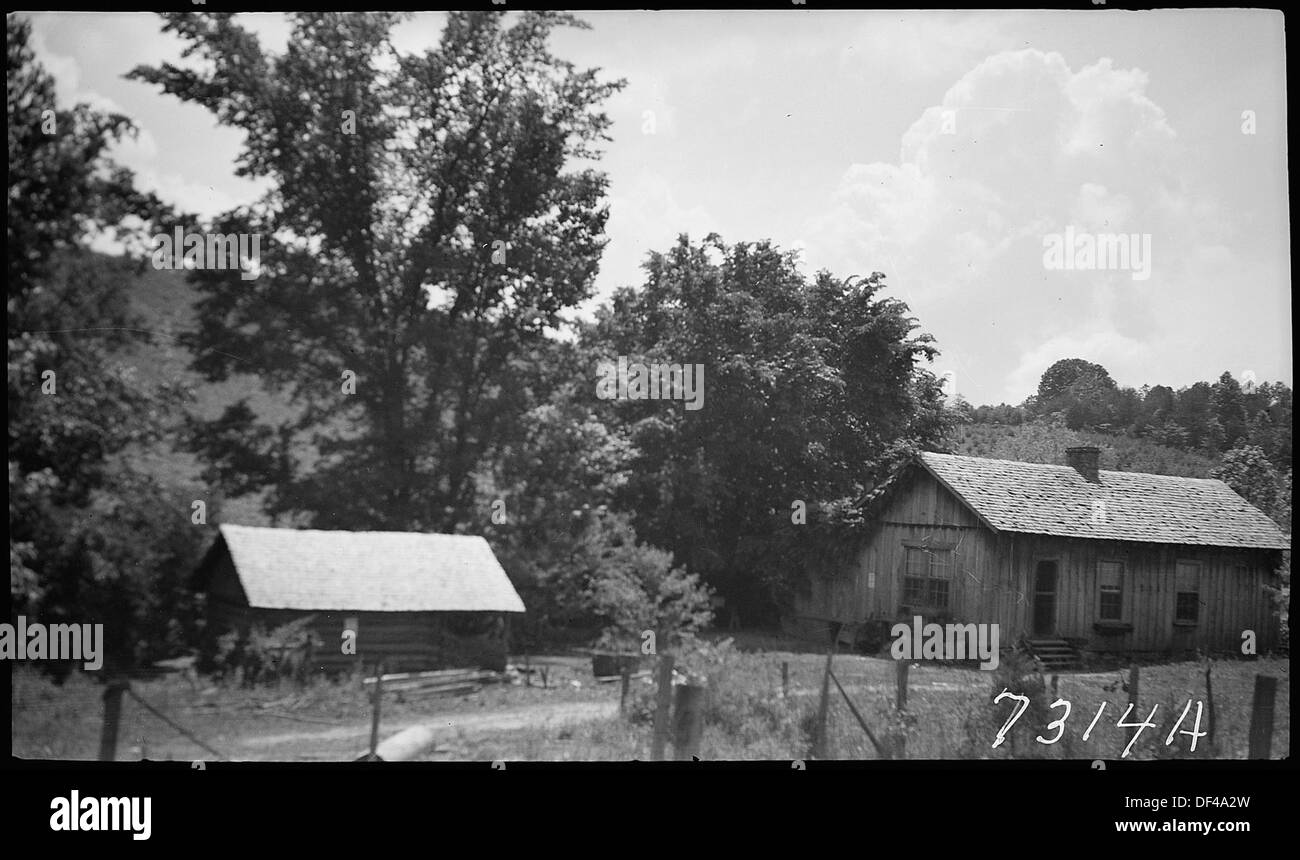 A historical image of the home of T.C. Fugate, capturing a glimpse of ...