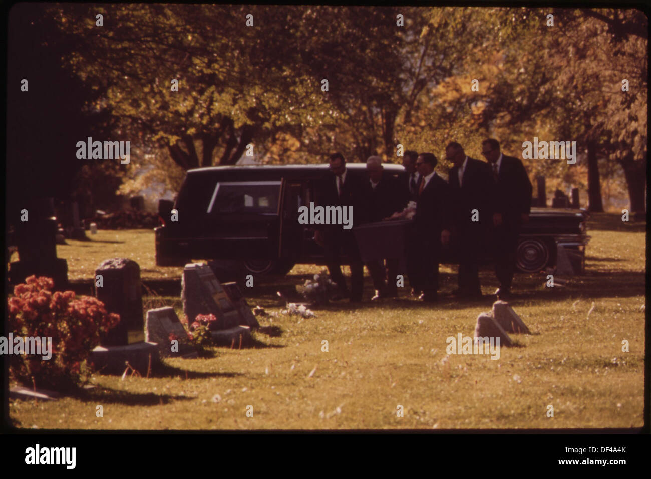 A historical photograph of a funeral at Rifle, Colorado, capturing a ...