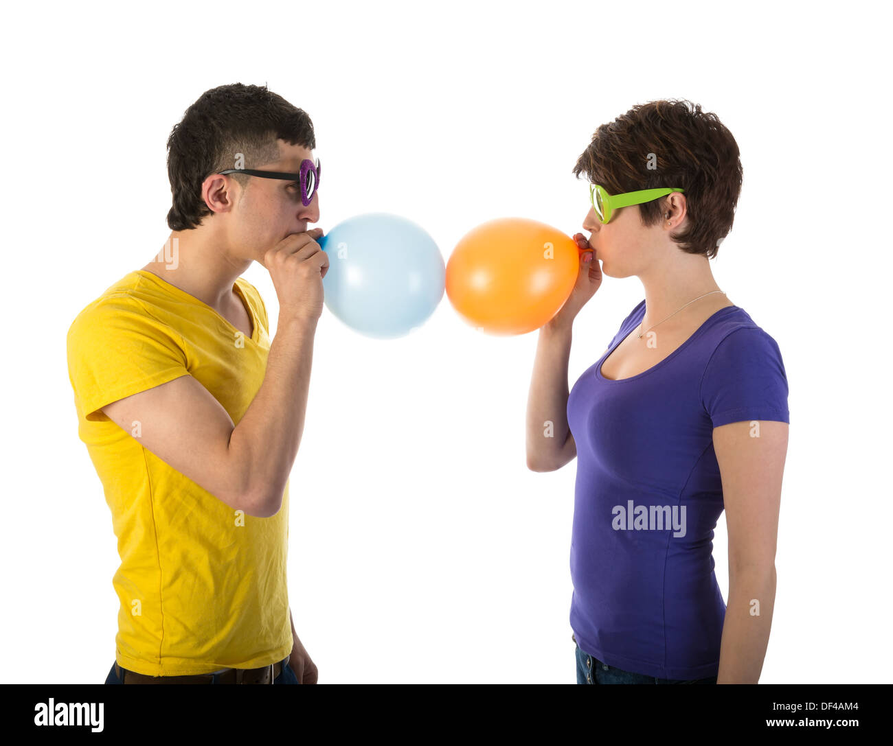 Woman inflating balloon hi-res stock photography and images - Alamy