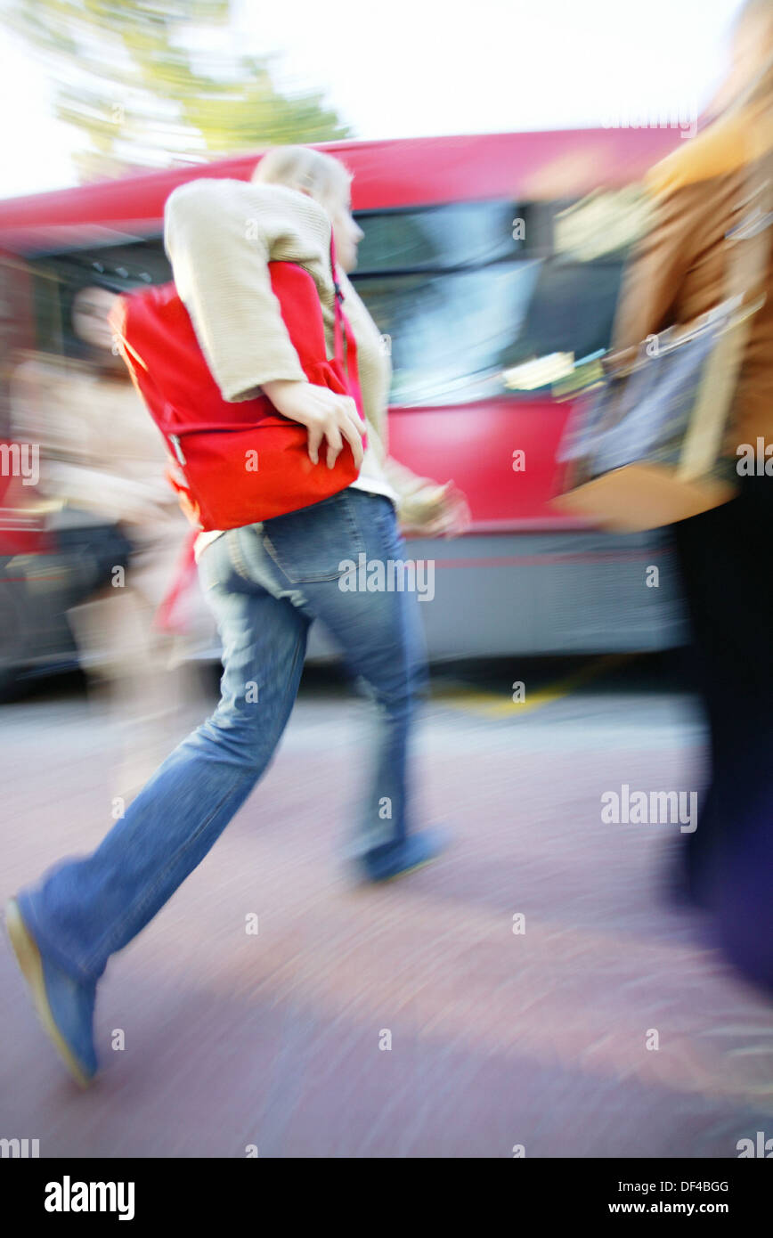 Adult student backpack running hi-res stock photography and images - Alamy