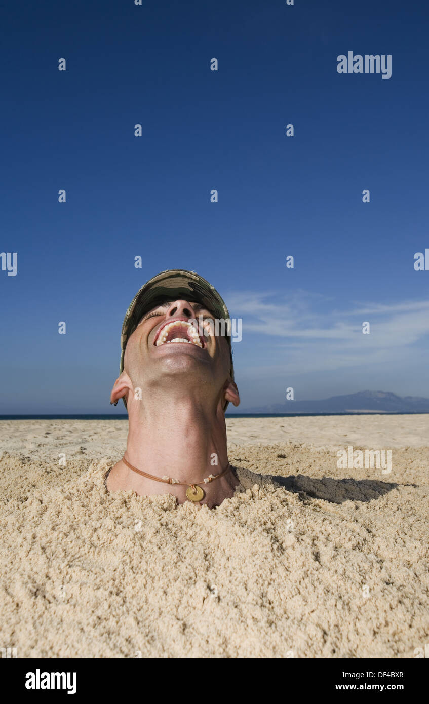 Man Coming Out of a Ditch Stock Photo - Alamy