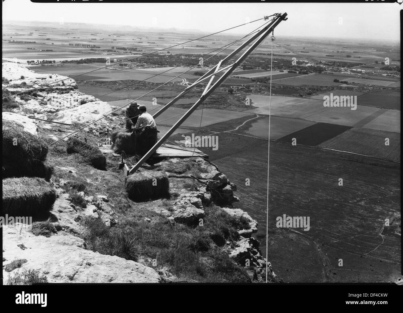 This image depicts a hand-operated winch, likely used for lifting or ...