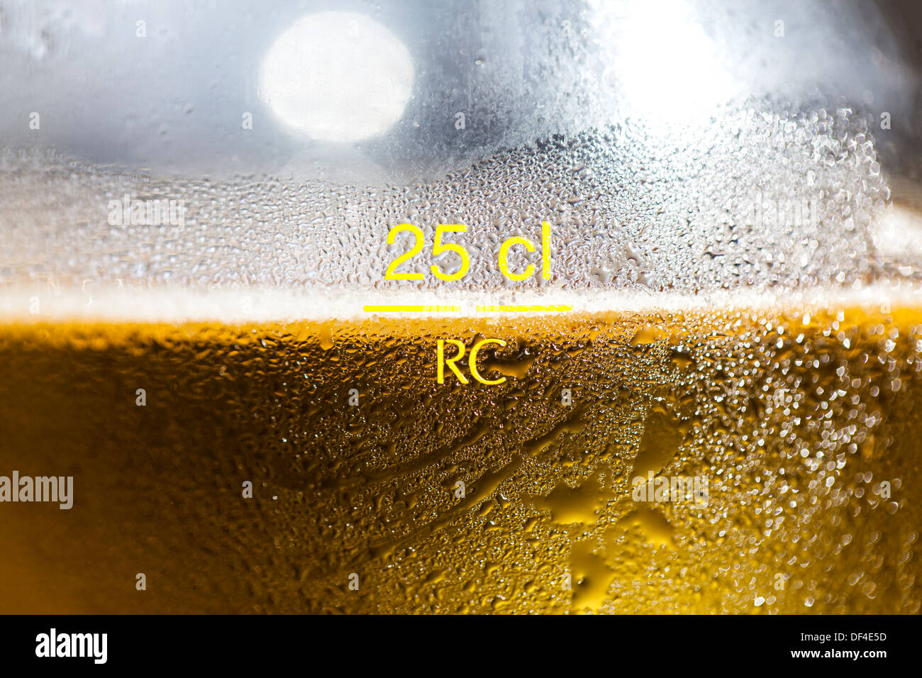 A close up of a beer glass filled to its 25cl marker. The 25cl marker ...