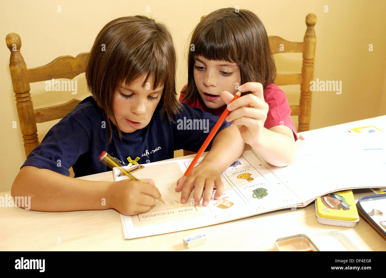 Kid help sibling homework hi-res stock photography and images - Alamy