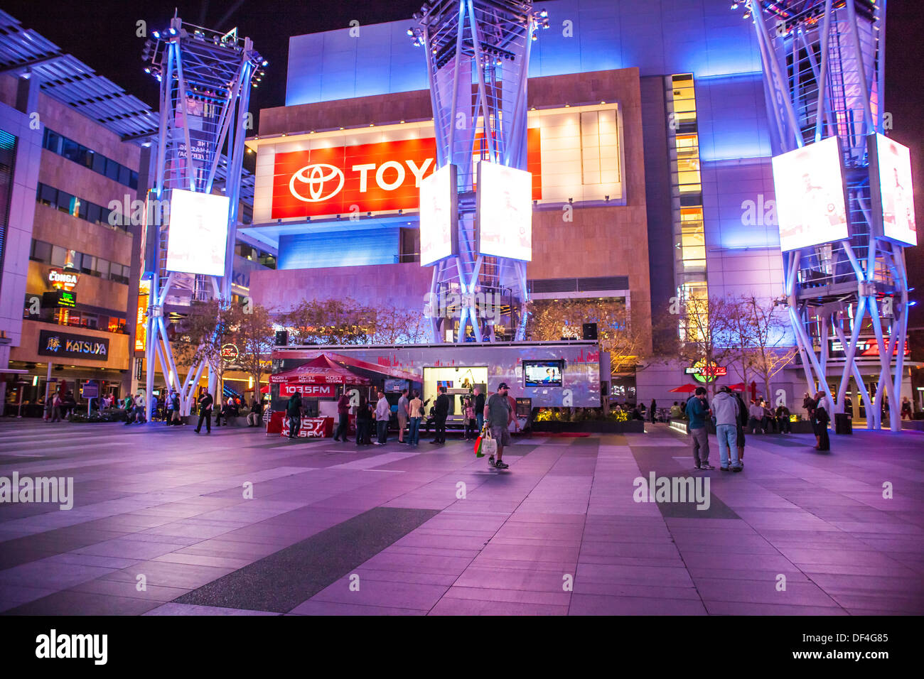 Nokia Plaza in Los Angeles at night with restaurants and Staples center ...