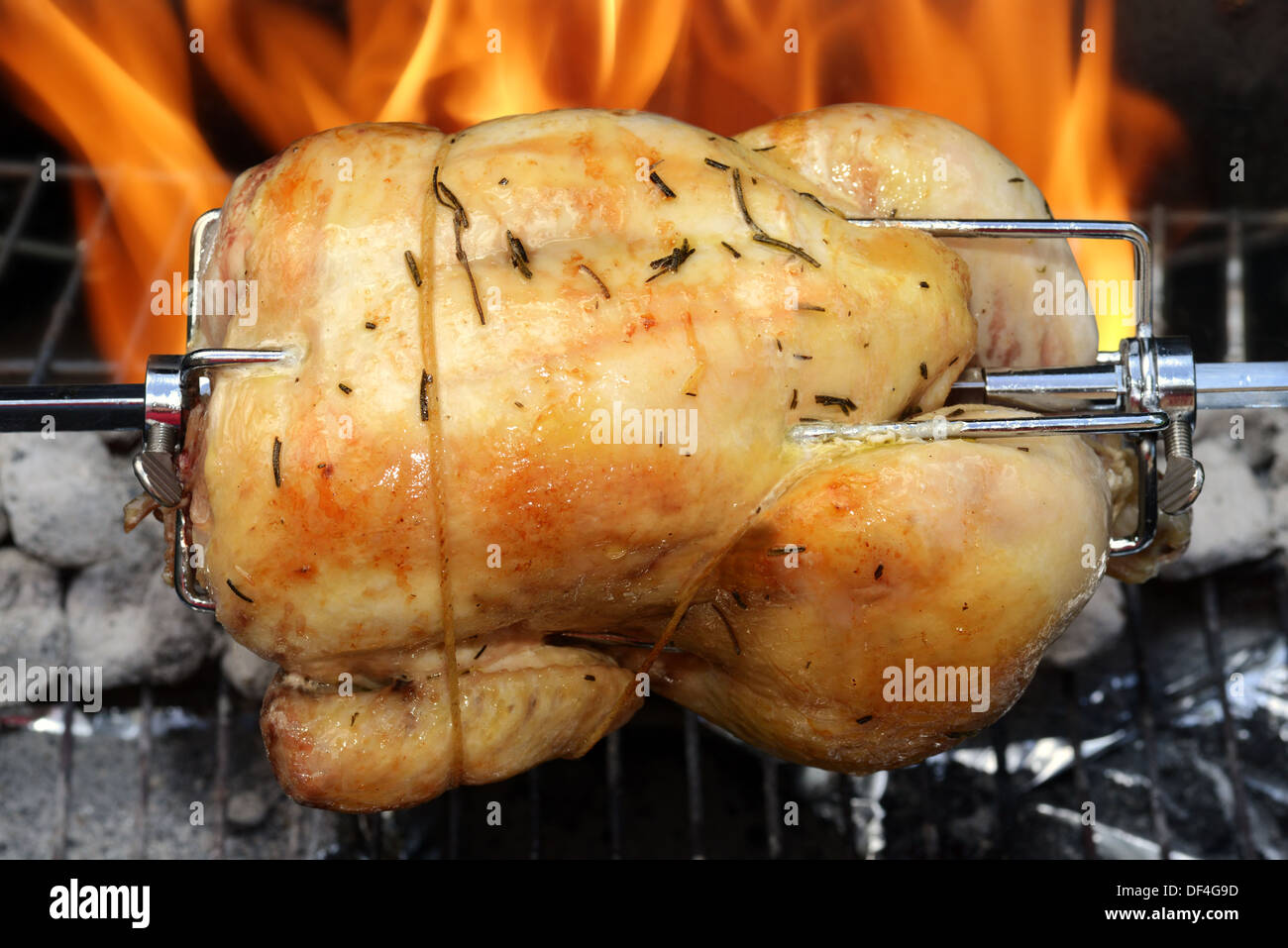 rotisserie chicken on the grill Stock Photo - Alamy