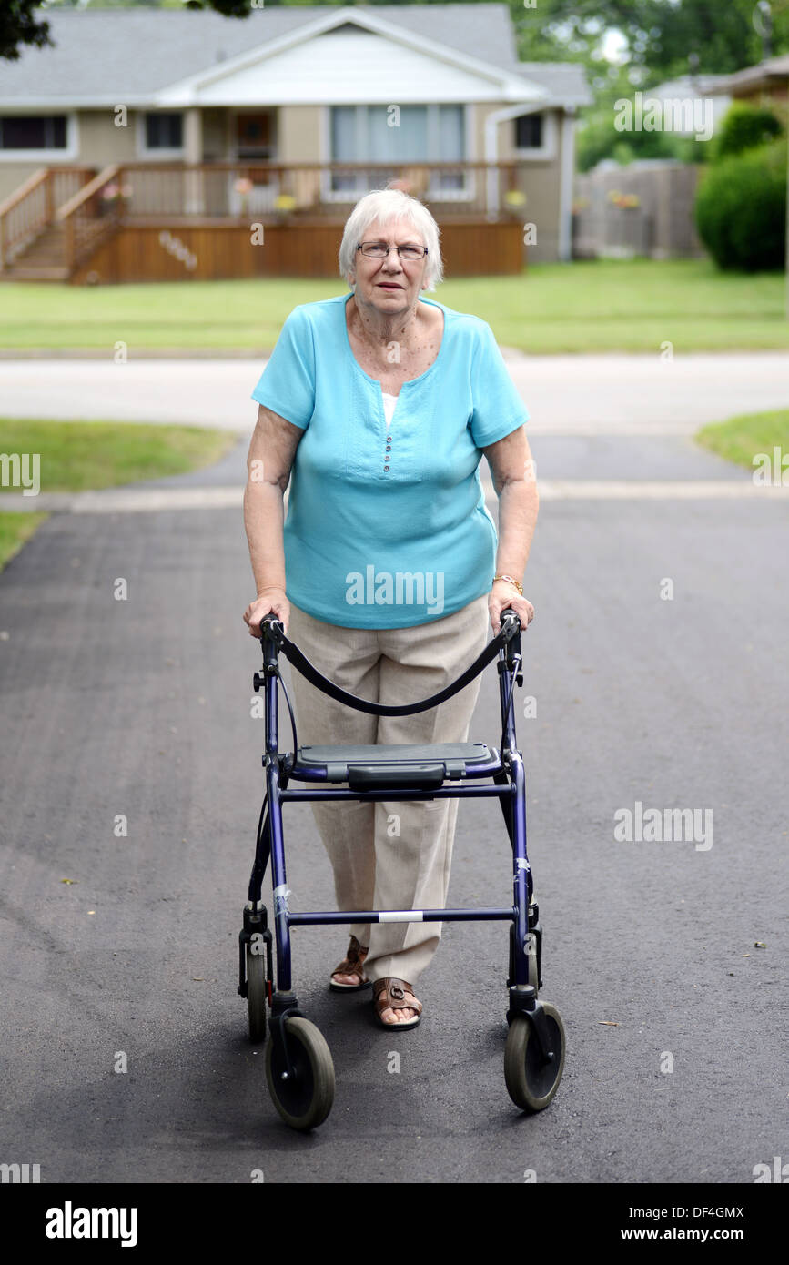 senior woman with walker Stock Photo - Alamy