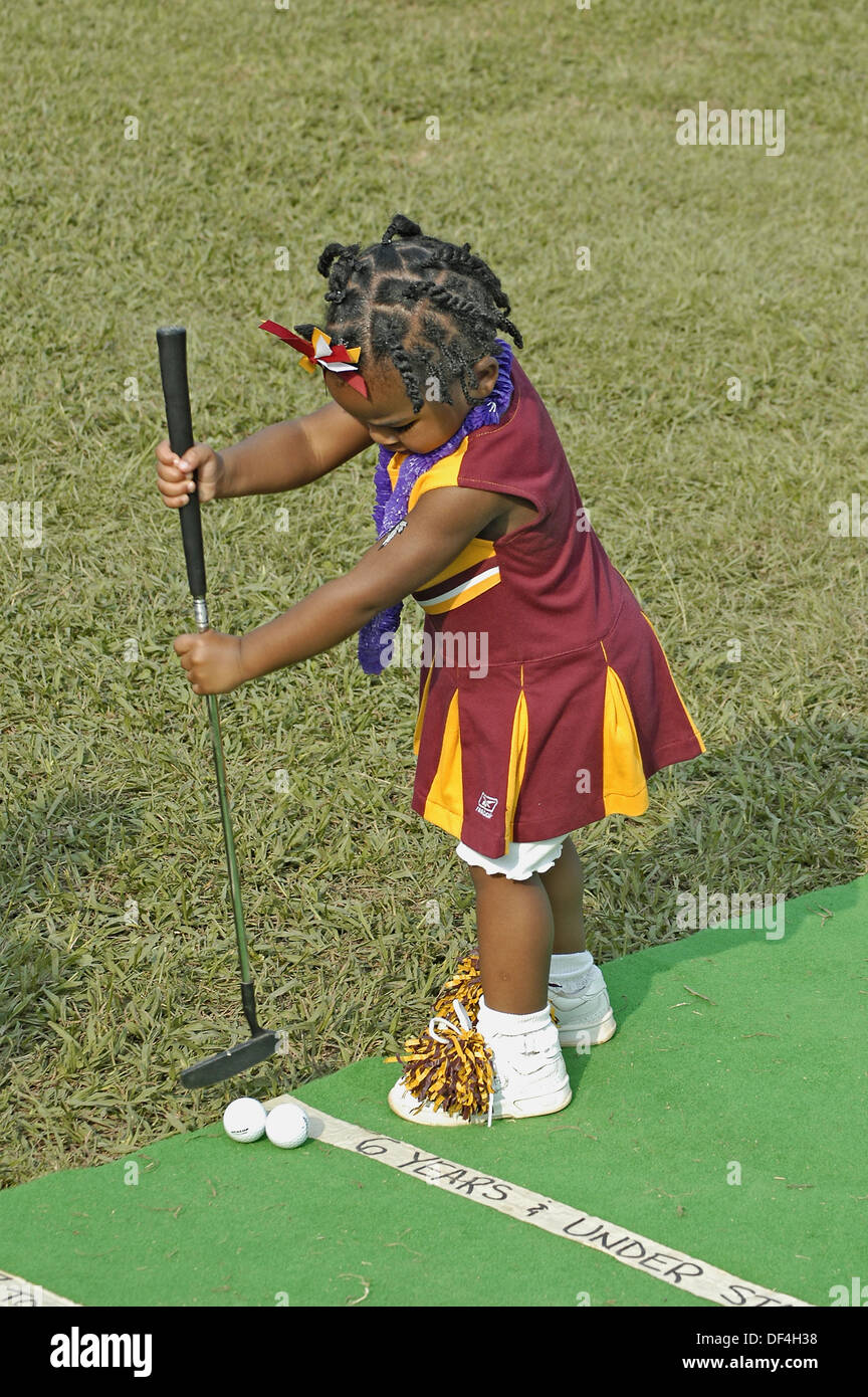 Child learning to play golf hi-res stock photography and images - Alamy