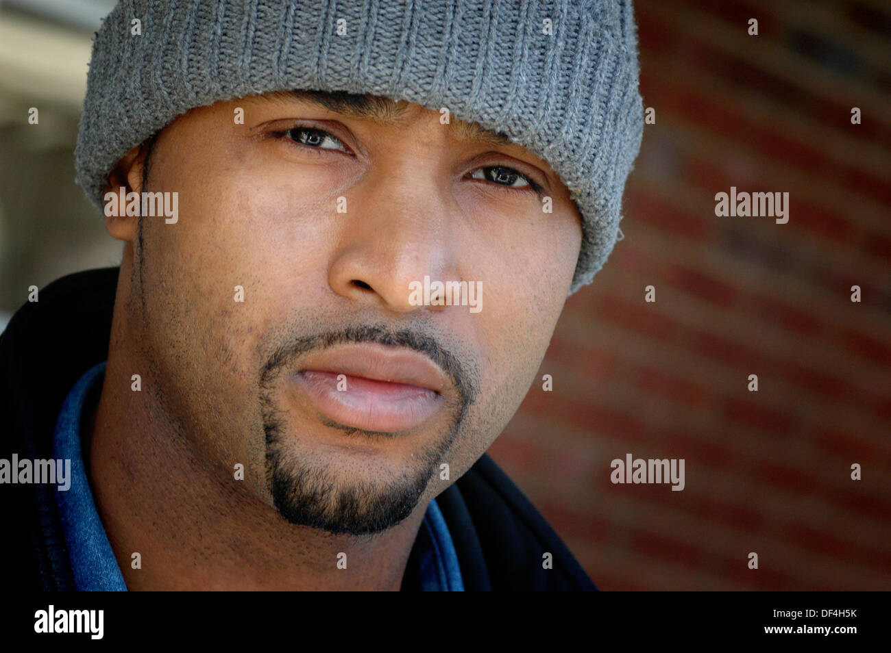 Man in black cap hi-res stock photography and images - Alamy